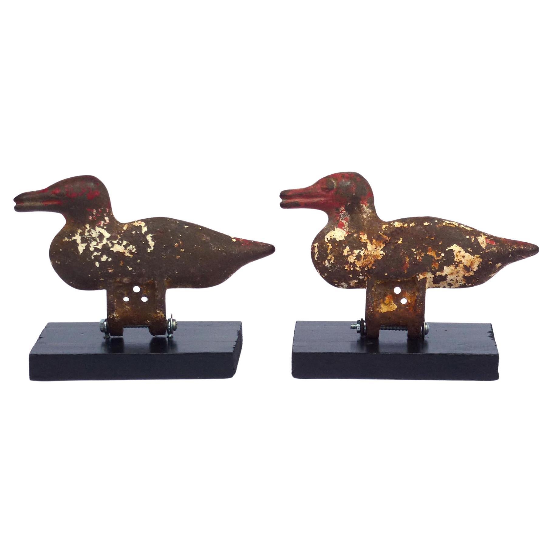 Pair of Cast Iron Duck Shooting Gallery Targets with Worn Red and White ...