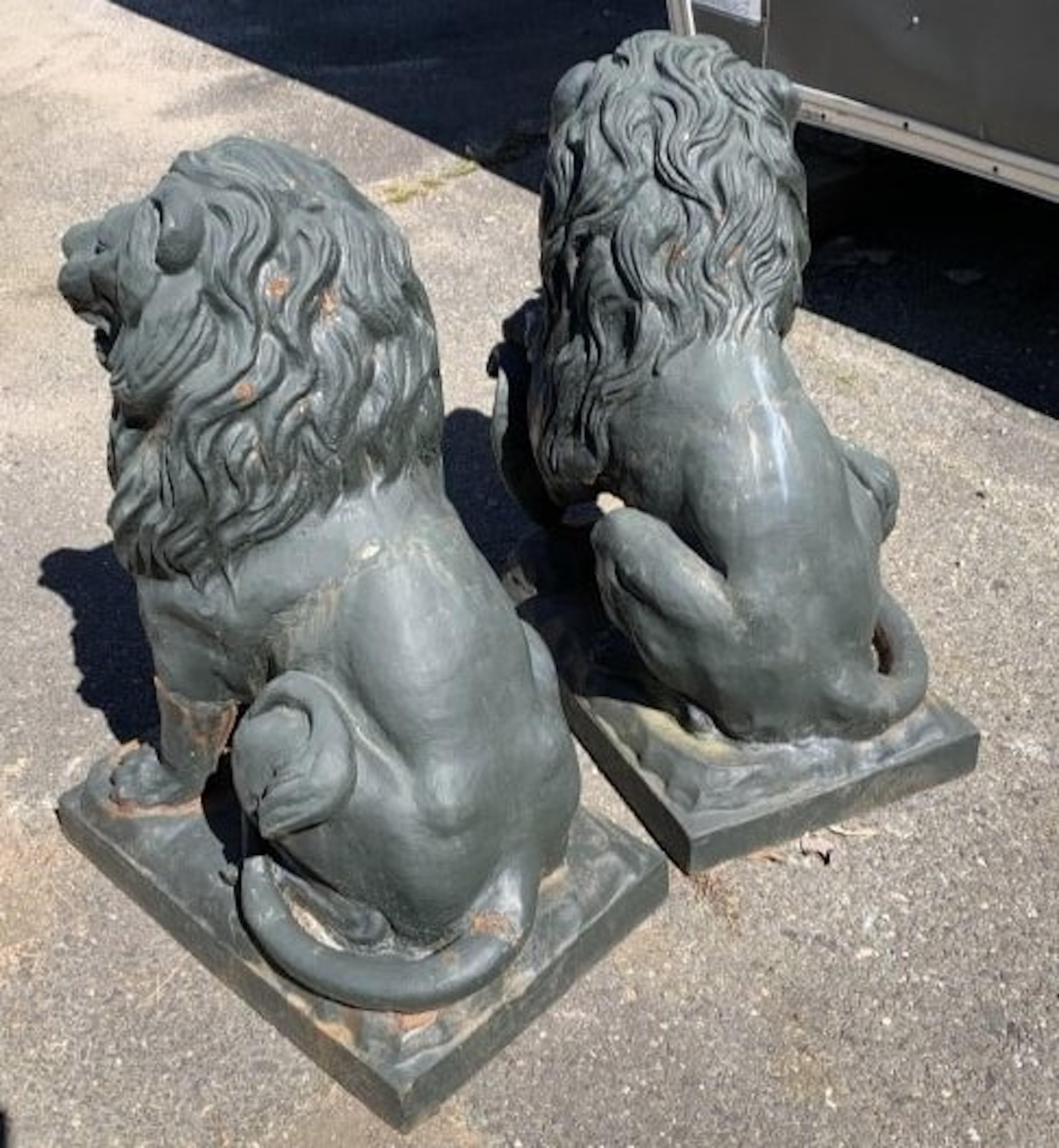 Pair of Cast Iron Lion Statues For Sale at 1stDibs