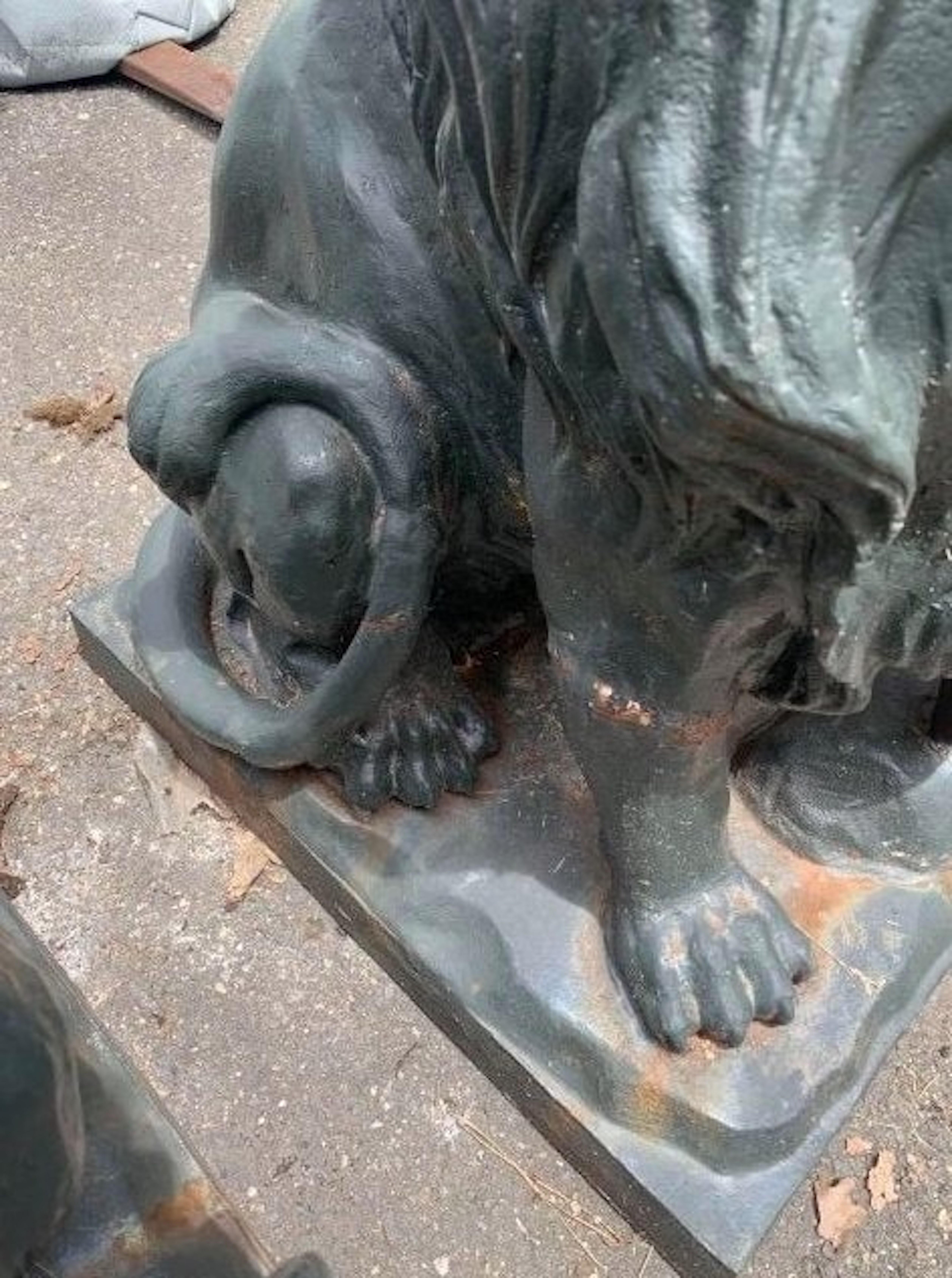 Pair of Cast Iron Lion Statues For Sale at 1stDibs