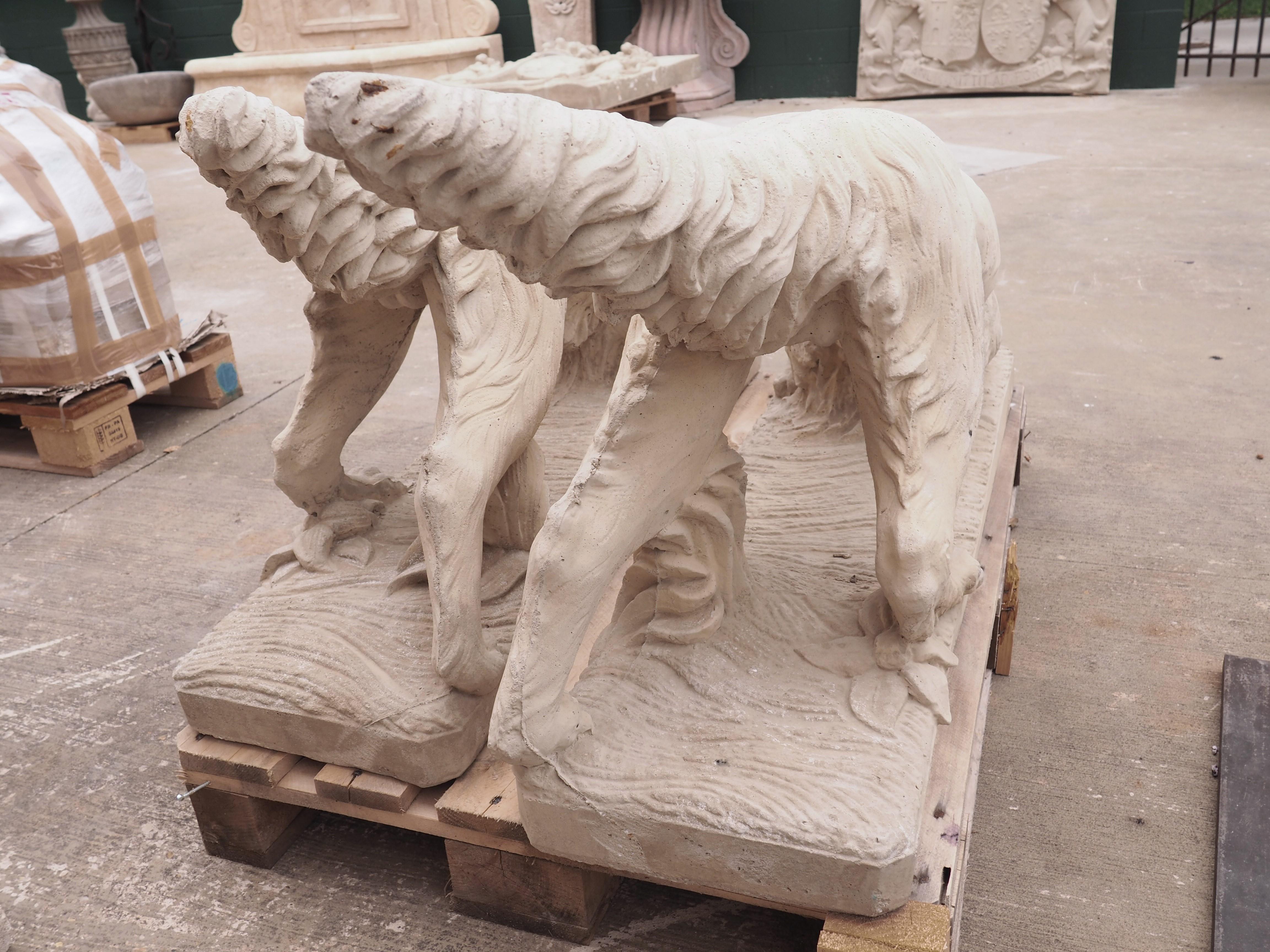 Pair of Cast Stone Dog Statues in a Light Sandstone Finish at 1stDibs
