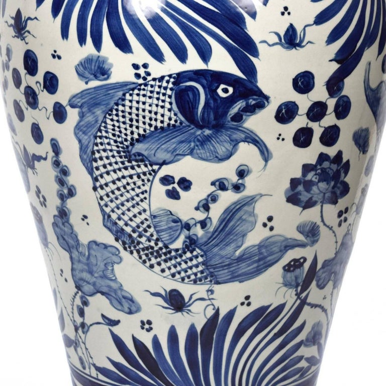 Pair of Chinese Monumental Blue and White Fish Jars with Shizi Tops For ...