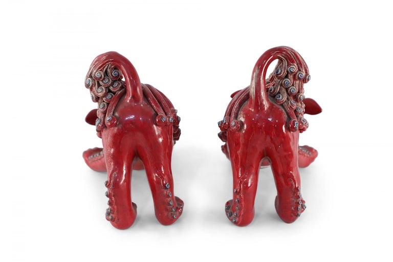 Pair of Chinese Shiwan Guangdong Red Porcelain Foo Dogs For Sale at 1stDibs