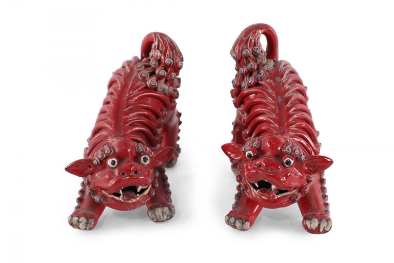 Pair of Chinese Shiwan Guangdong Red Porcelain Foo Dogs For Sale at 1stDibs
