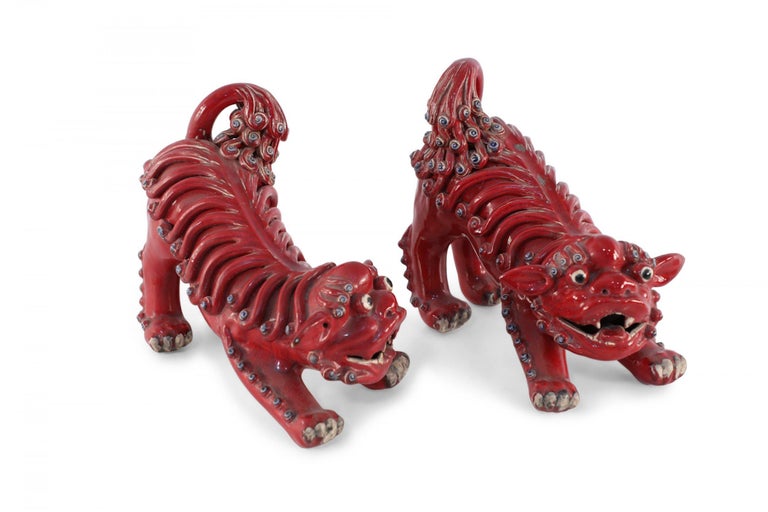Pair of Chinese Shiwan Guangdong Red Porcelain Foo Dogs For Sale at 1stDibs