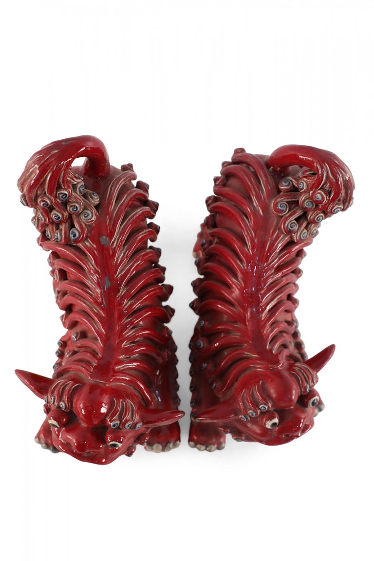 Pair of Chinese Shiwan Guangdong Red Porcelain Foo Dogs For Sale at 1stDibs