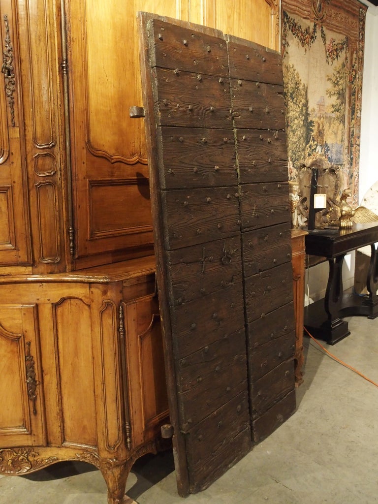 Pair of circa 1700 Italian Larch Wood Doors with Nailheads at 1stDibs