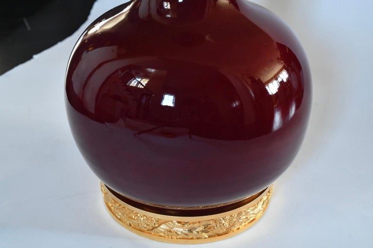 Pair of Copper Red Glazed Porcelain Lamps For Sale at 1stDibs