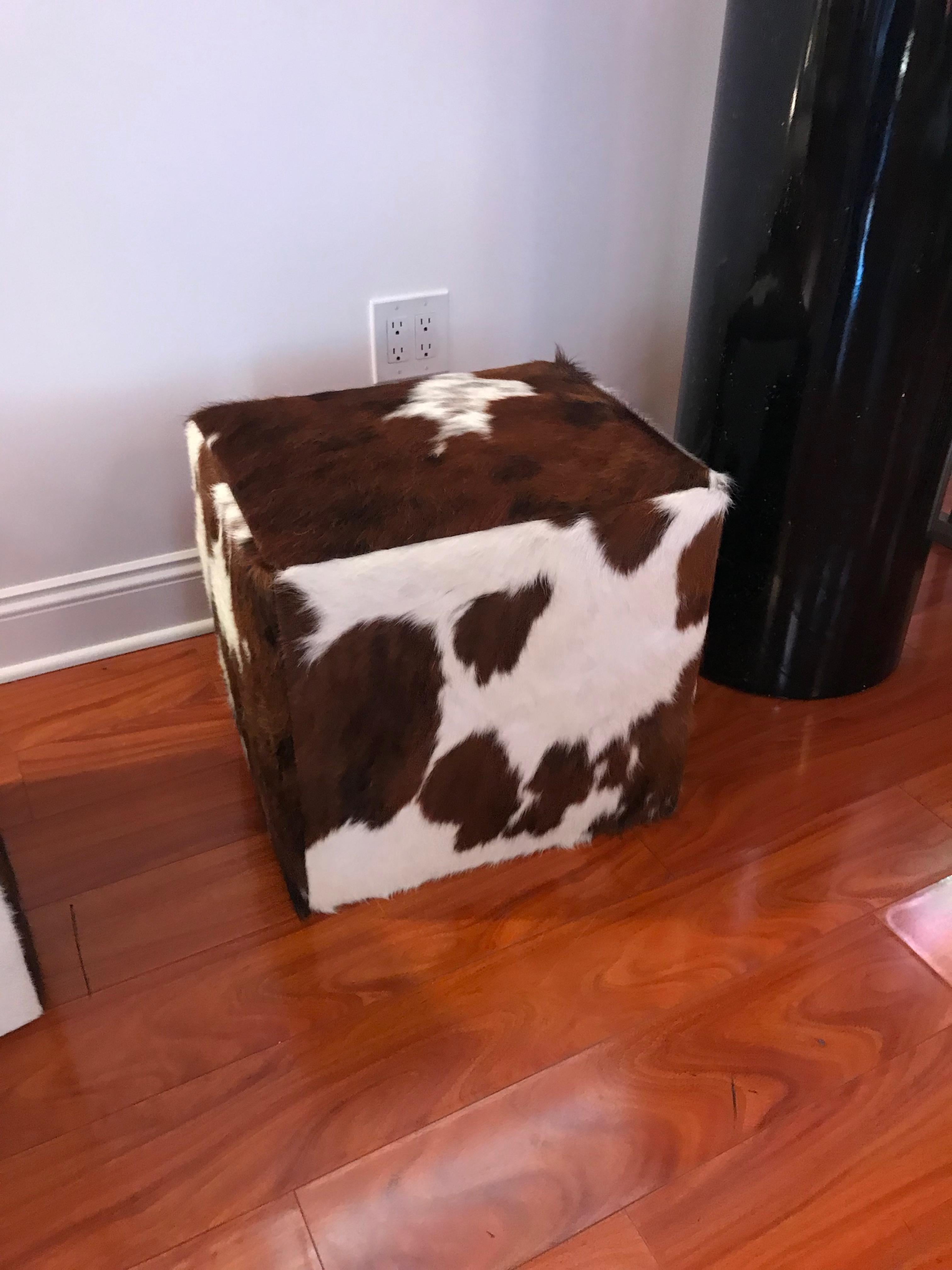 Pair of Cow Hide Benches or Ottomans at 1stDibs
