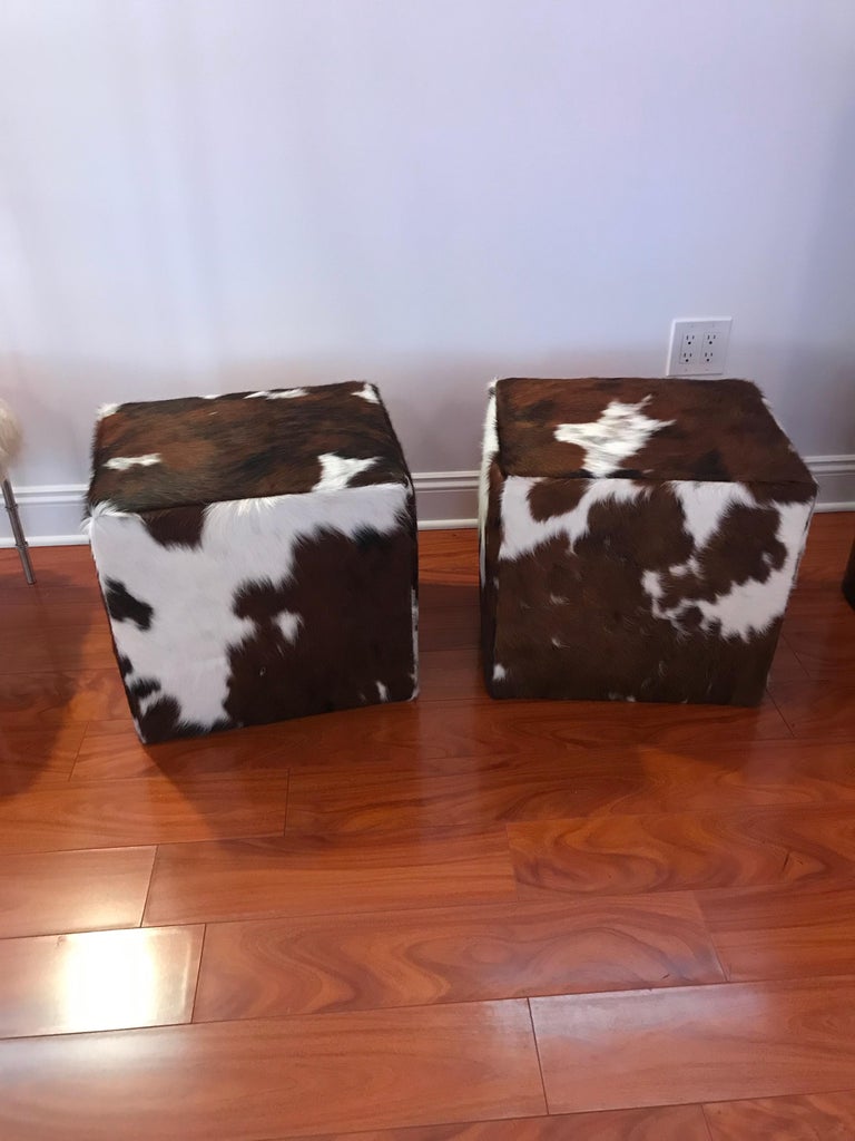Pair of Cow Hide Benches or Ottomans at 1stDibs