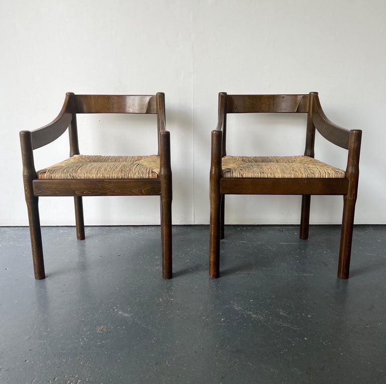 Pair of Dark Wood Carimate Carver Chairs by Vico Magistretti For Sale ...