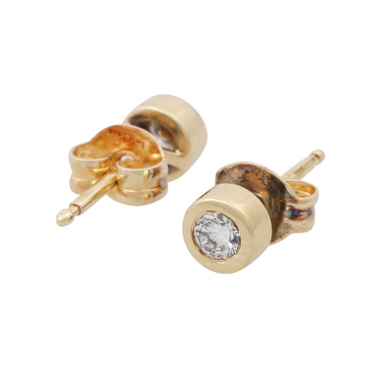 Pair of ear studs with 2 diamonds, For Sale at 1stDibs