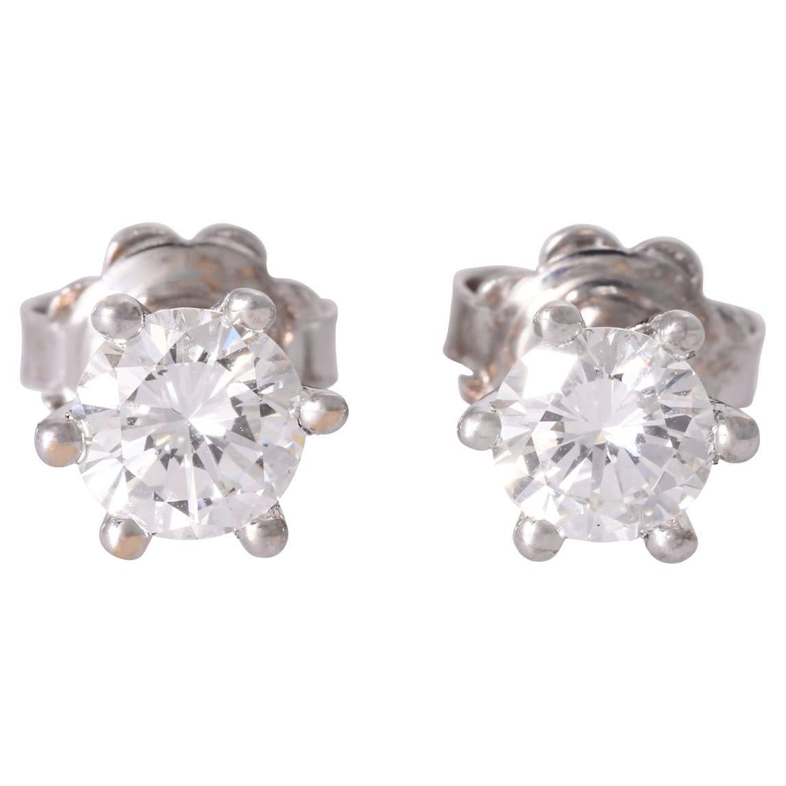 Pair of ear studs with 2 diamonds, For Sale at 1stDibs