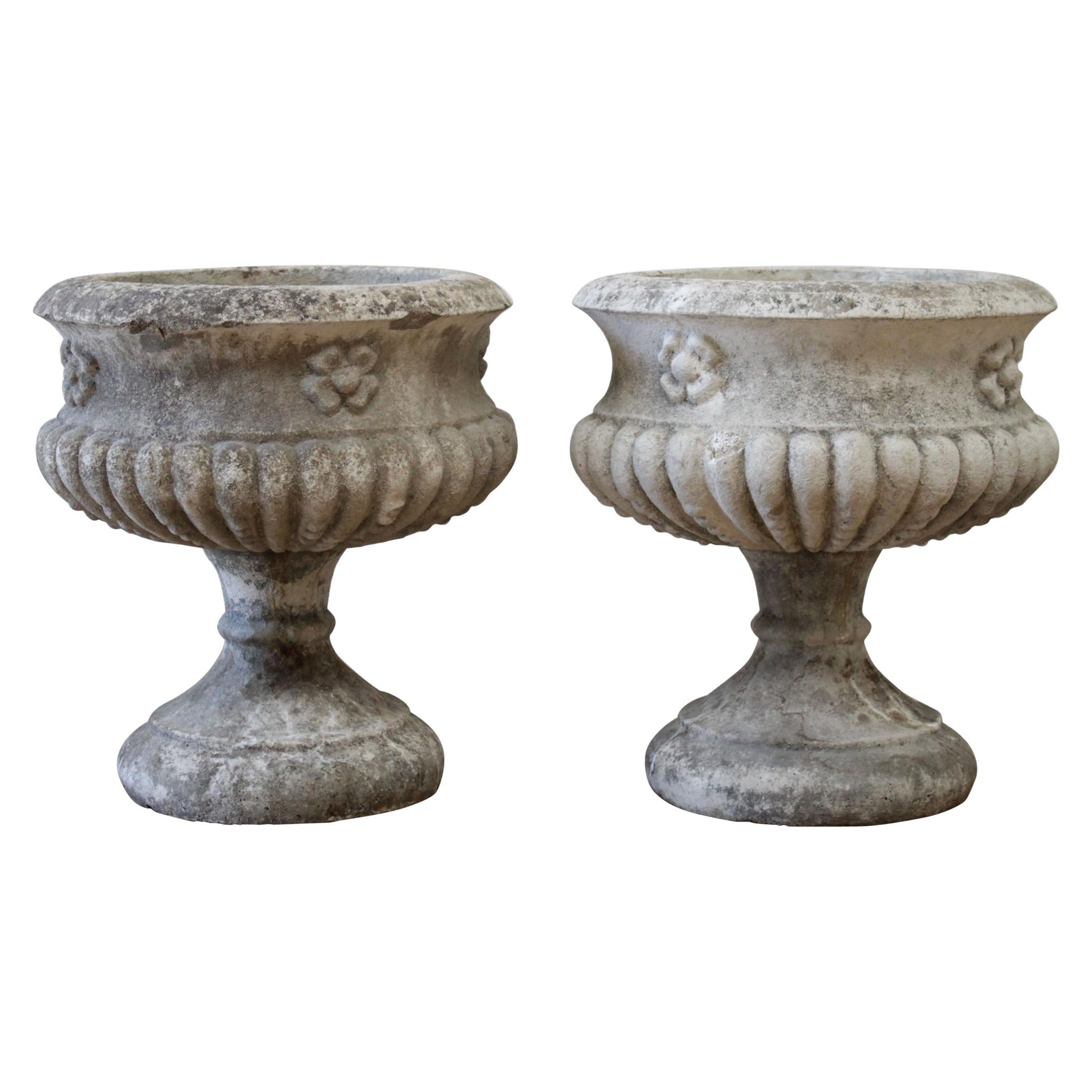 Pair of Early 20th Century Cast Stone Pedestal Urns at 1stDibs