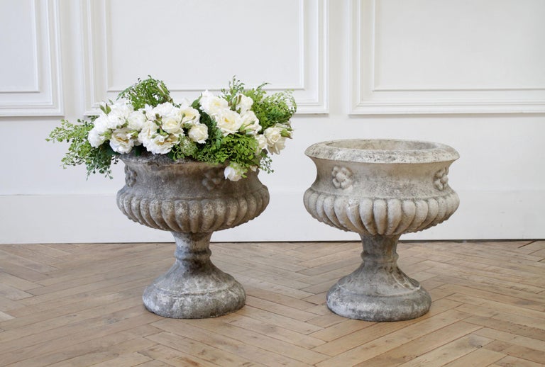 Pair of Early 20th Century Cast Stone Pedestal Urns at 1stDibs