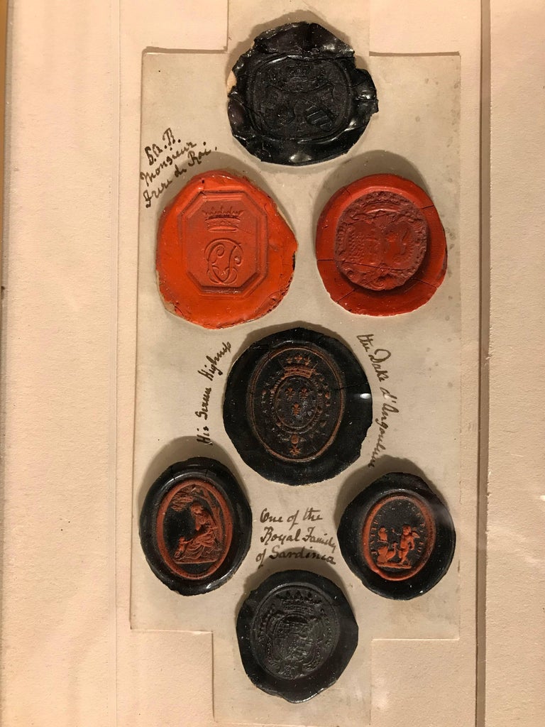 Pair of Framed Red and Black Wax Intaglio Seals at 1stDibs
