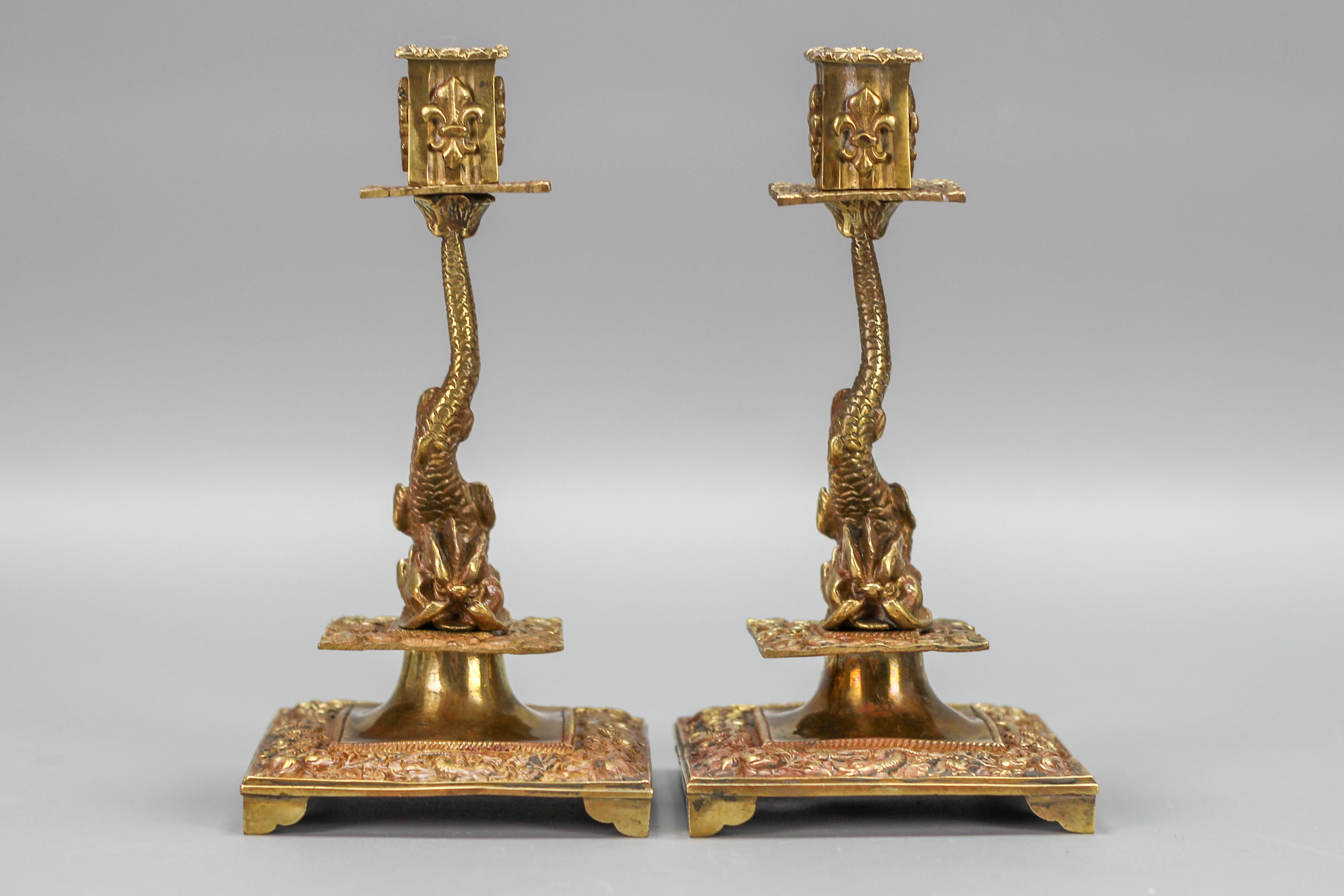 Pair of French Brass Candlesticks with Dolphin Figures For Sale at 1stDibs