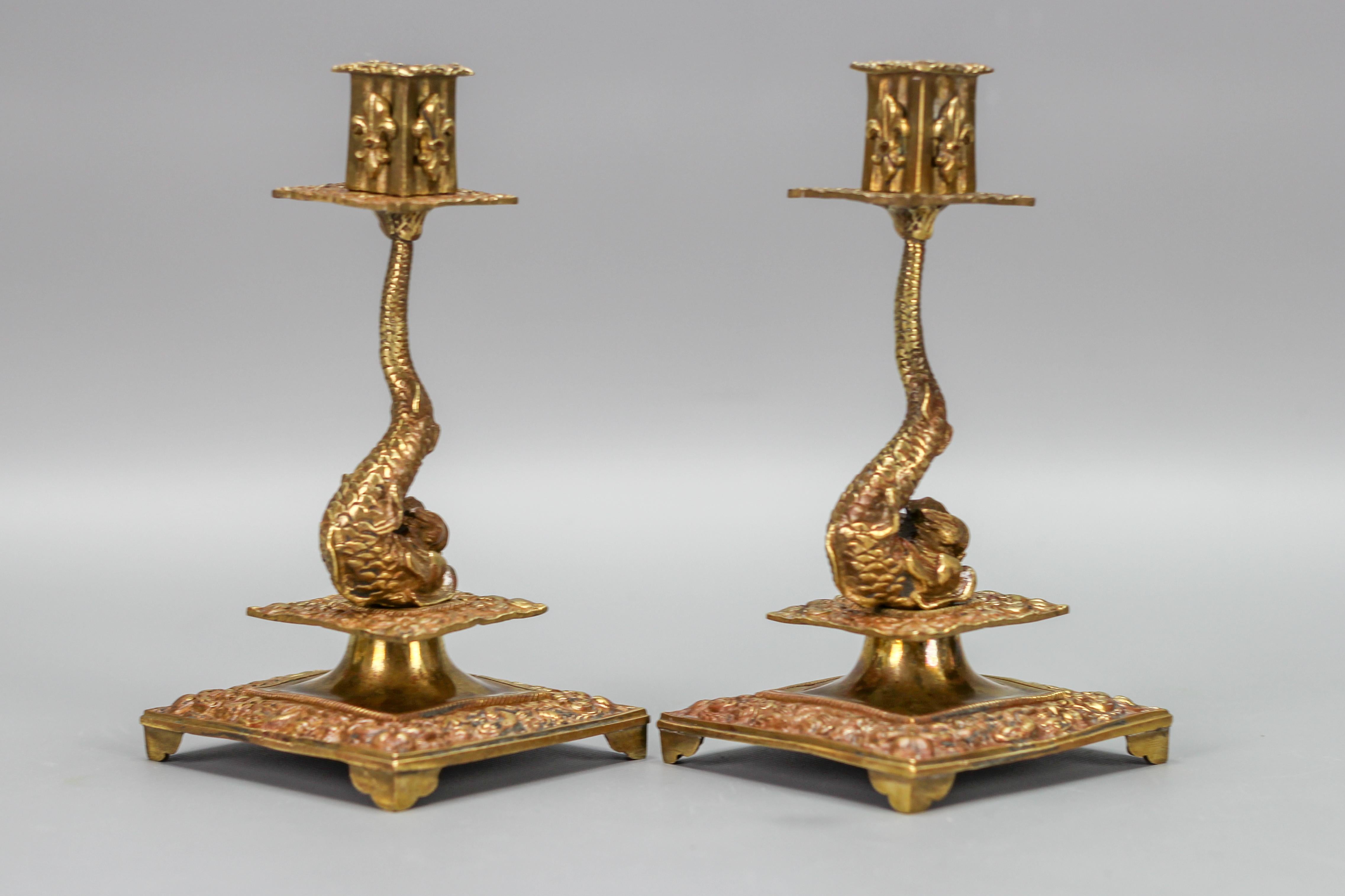 Pair of French Brass Candlesticks with Dolphin Figures For Sale at 1stDibs