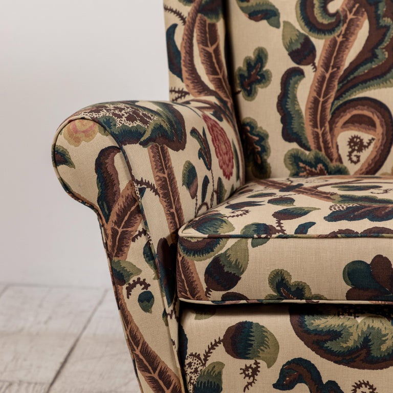 Pair of French Wingback Chairs upholstered in Floral Fabric at 1stDibs