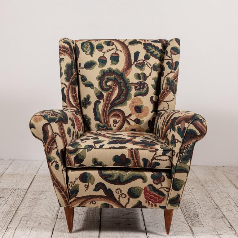 Pair of French Wingback Chairs upholstered in Floral Fabric at 1stDibs