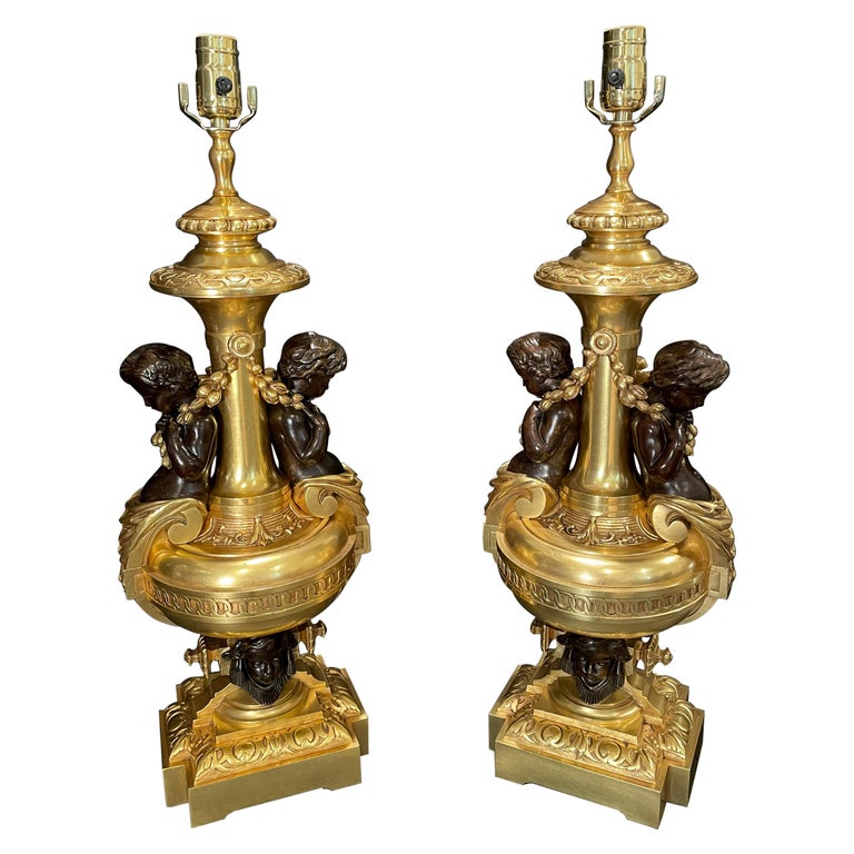 Pair of Gilt and Patinated Putti Lamps For Sale at 1stDibs