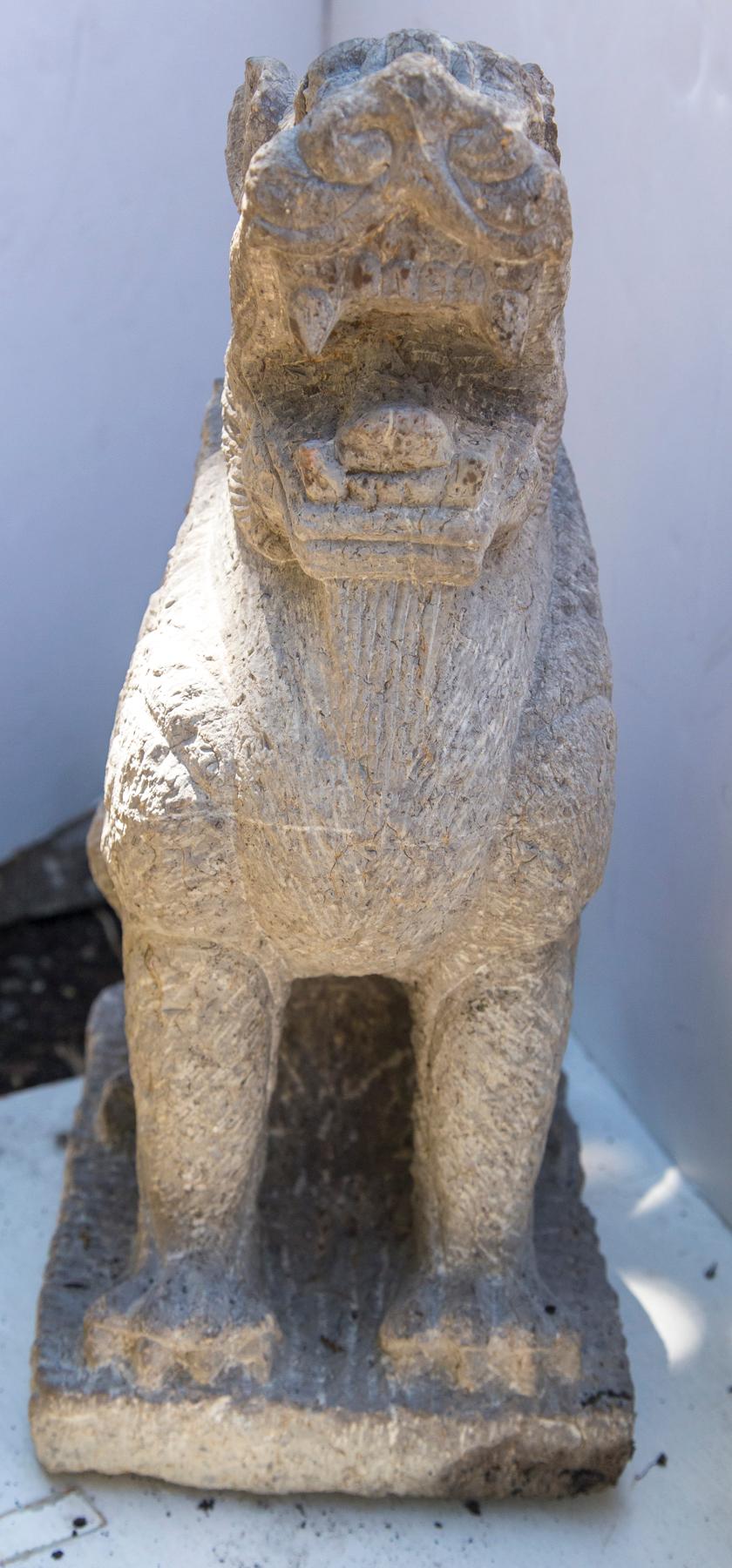 Pair of Hand Carved Stone Winged Beasts For Sale at 1stDibs