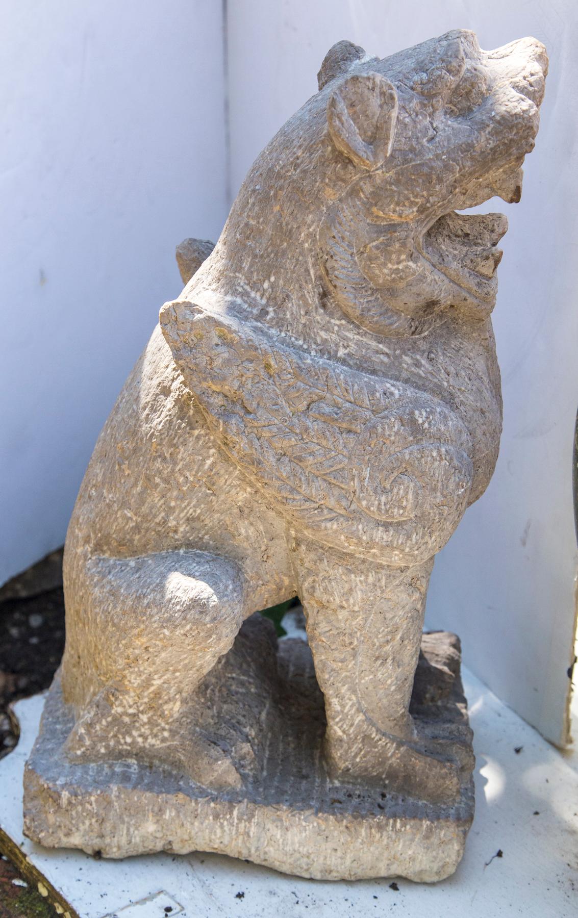 Pair of Hand Carved Stone Winged Beasts For Sale at 1stDibs