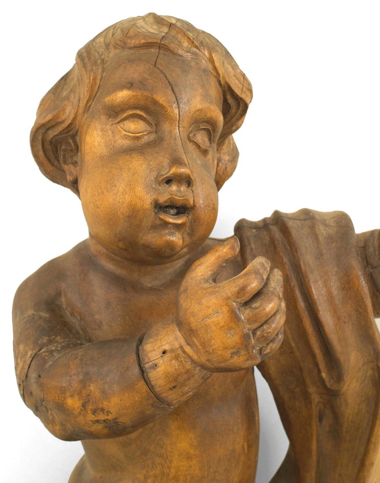 Pair of Italian Rococo Fruitwood Putti Figures For Sale at 1stDibs