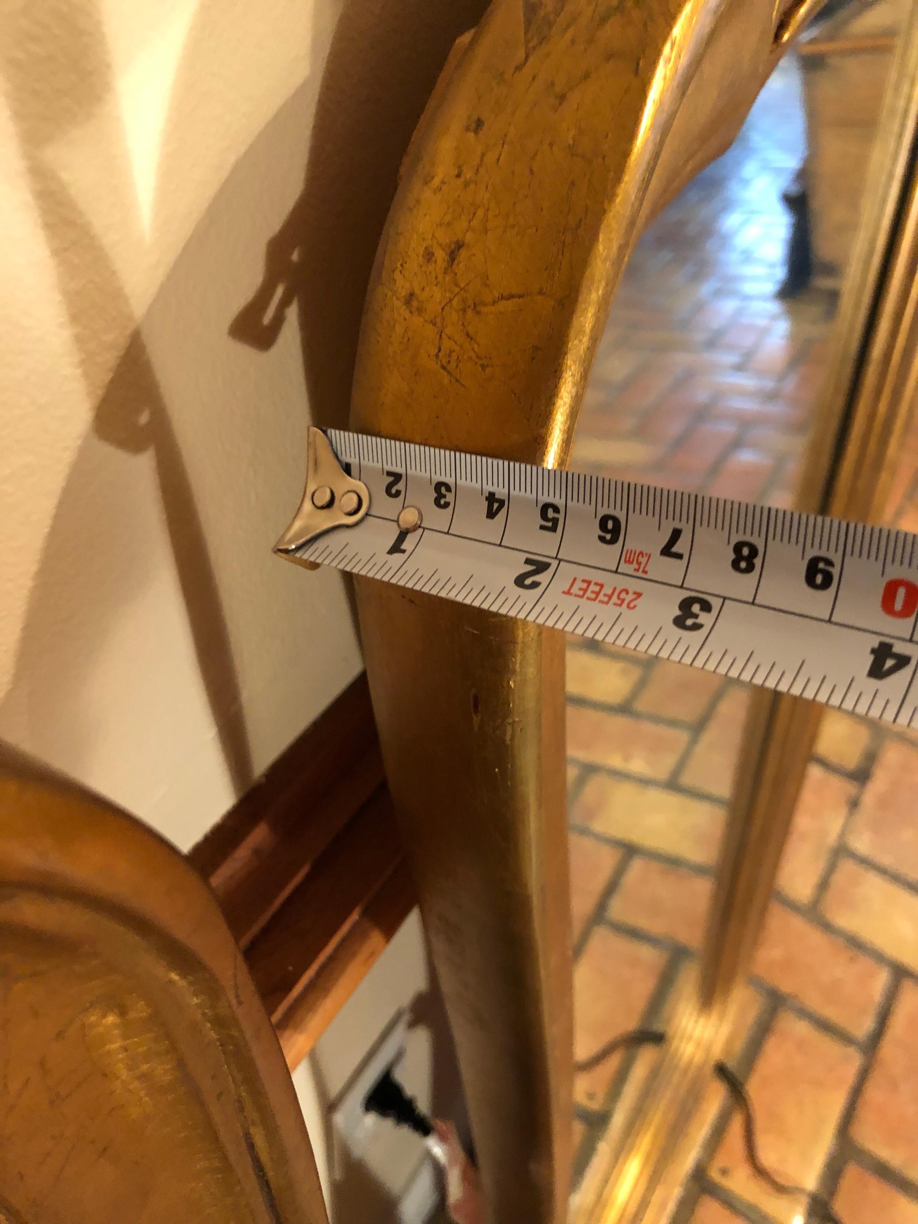 Pair of Hollywood Regency Gilt Mirrors at 1stDibs