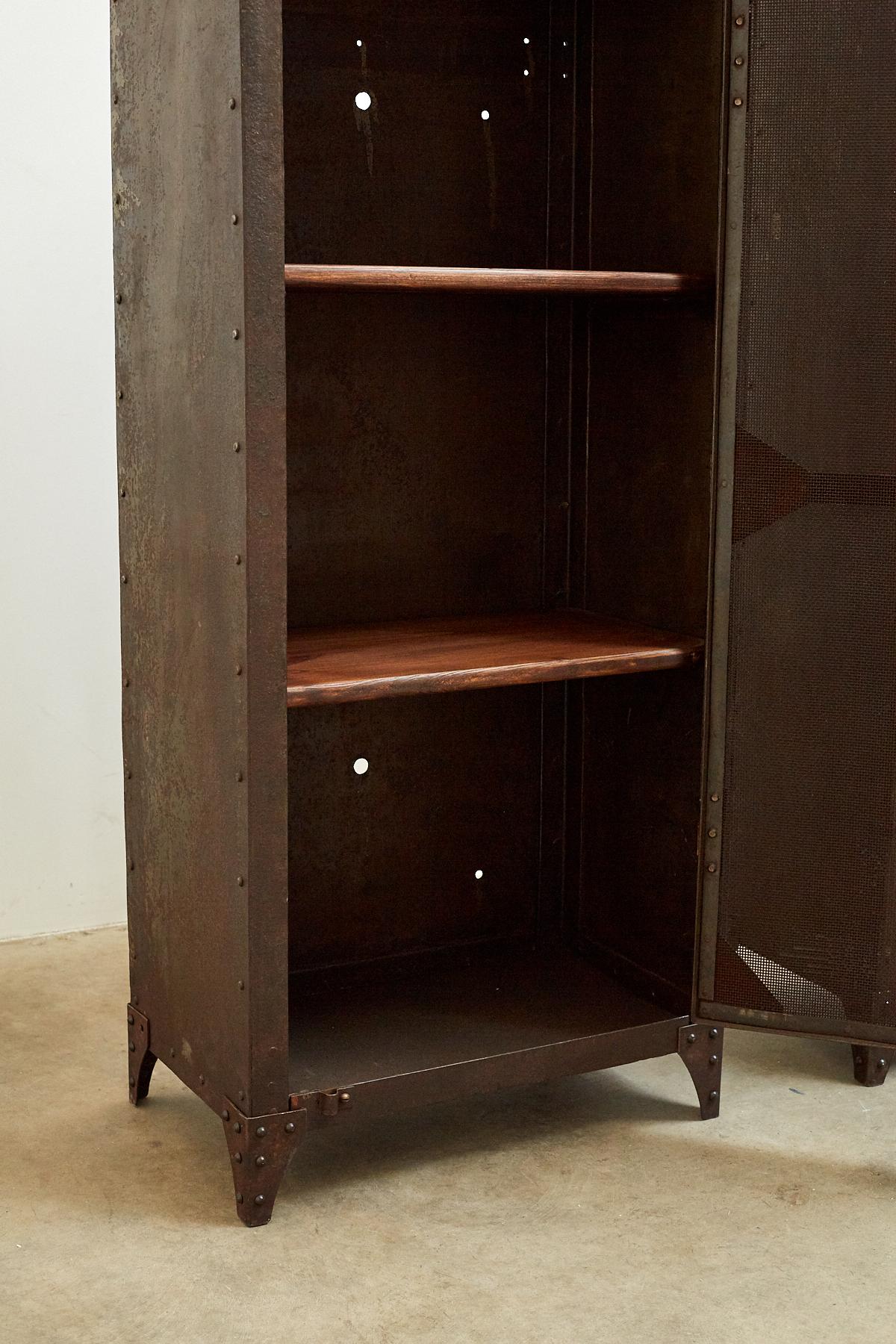 Pair of Industrial Patinated Iron Locker Cabinets at 1stDibs