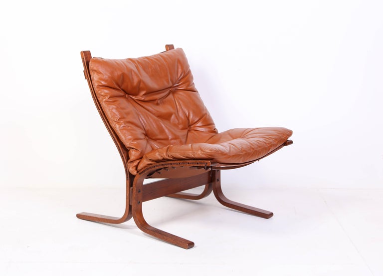Pair of Ingmar Relling "Siesta" Tan Leather Chairs by Westnofa at 1stDibs