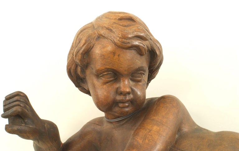 Pair of Italian Rococo Walnut Cupid Figures For Sale at 1stDibs