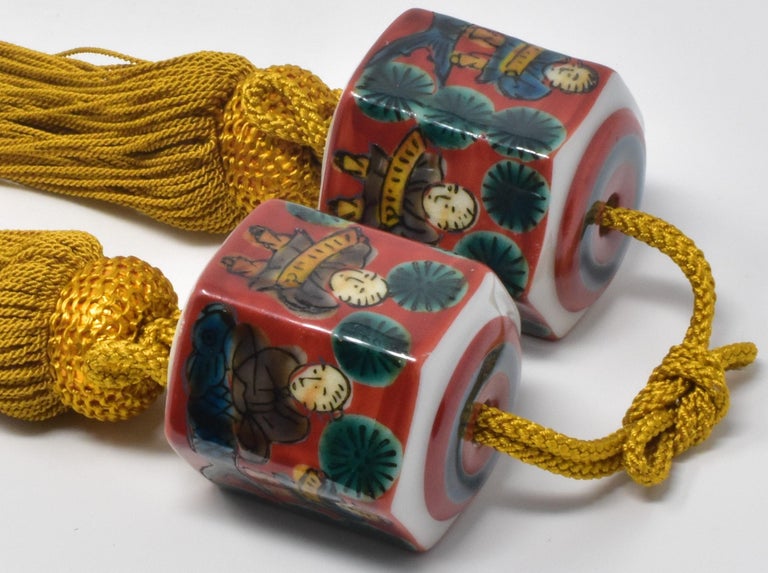 Pair of Japanese Blue Red Porcelain Scroll Weights For Sale at 1stDibs