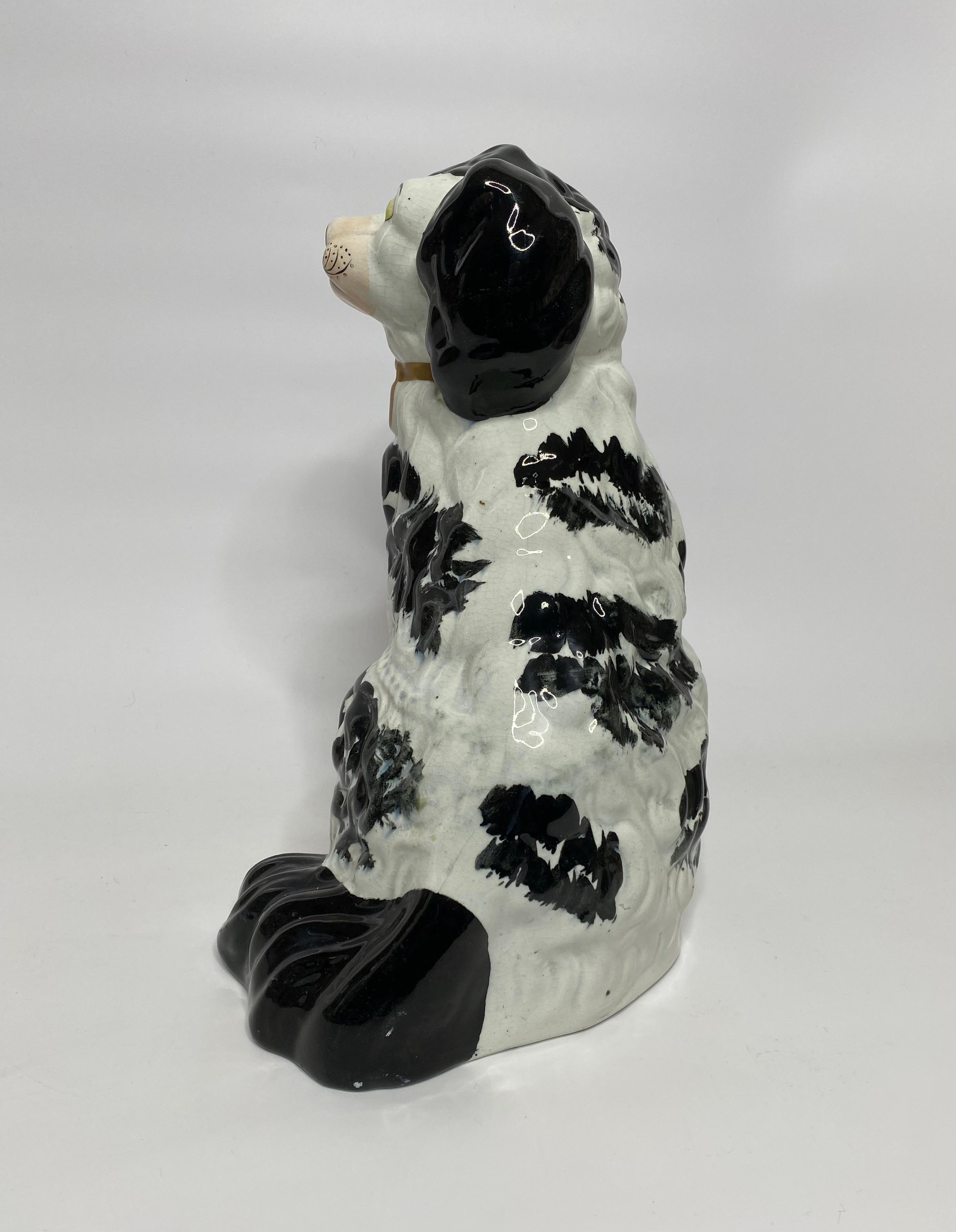 Pair of large and rare Staffordshire Spaniels, c. 1840. For Sale at 1stDibs