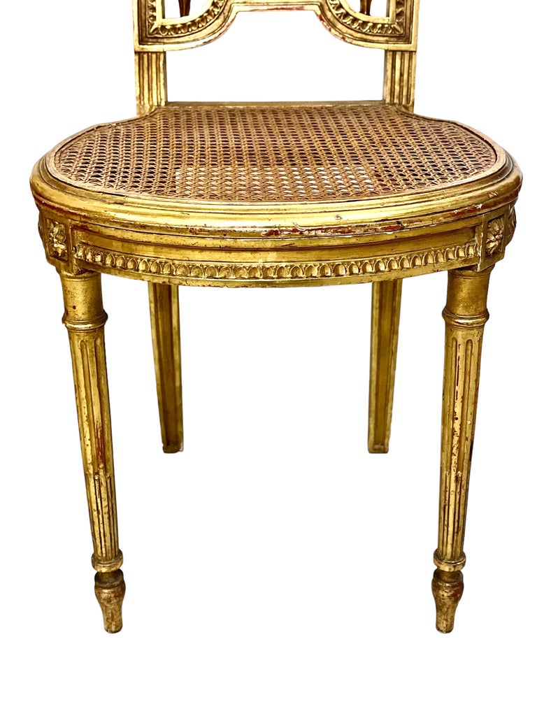 Pair of Louis XVI Style Caned and Gilded Chairs For Sale at 1stDibs