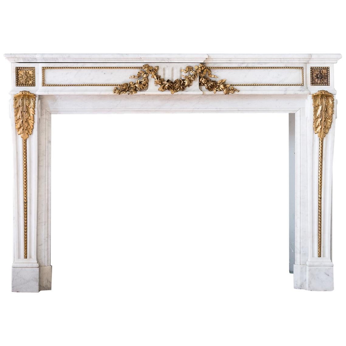 A pair of Louis XVI Style Carrara Marble Fireplace Surround, at 1stDibs
