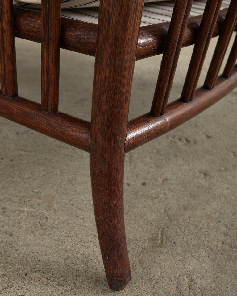 Pair of McGuire Pole Rattan Lounge Chairs with Ottoman For Sale at 1stDibs