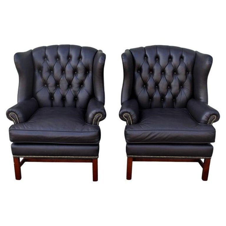 Pair of Mid-Century Black Leather Wing Chair at 1stDibs