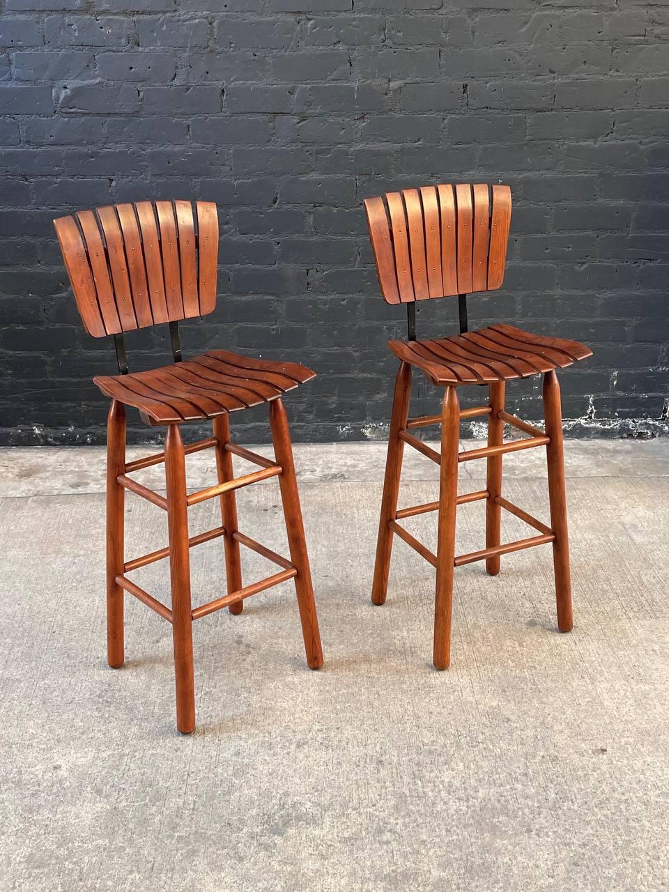 Pair of Mid-Century Modern Sculpted Slatted Walnut and Iron Bar Stools ...
