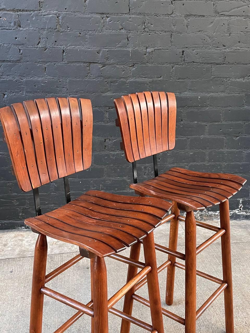 Pair of Mid-Century Modern Sculpted Slatted Walnut and Iron Bar Stools ...