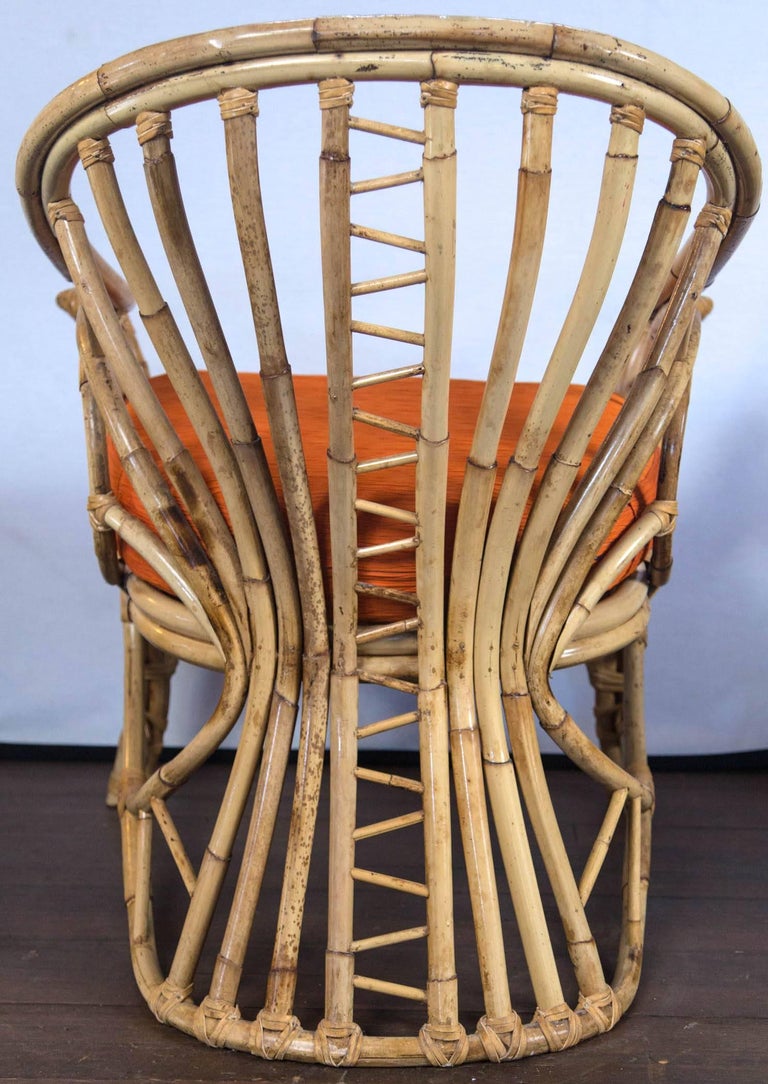 Pair of Midcentury Circle Sided Rattan Arm Chairs For Sale at 1stDibs