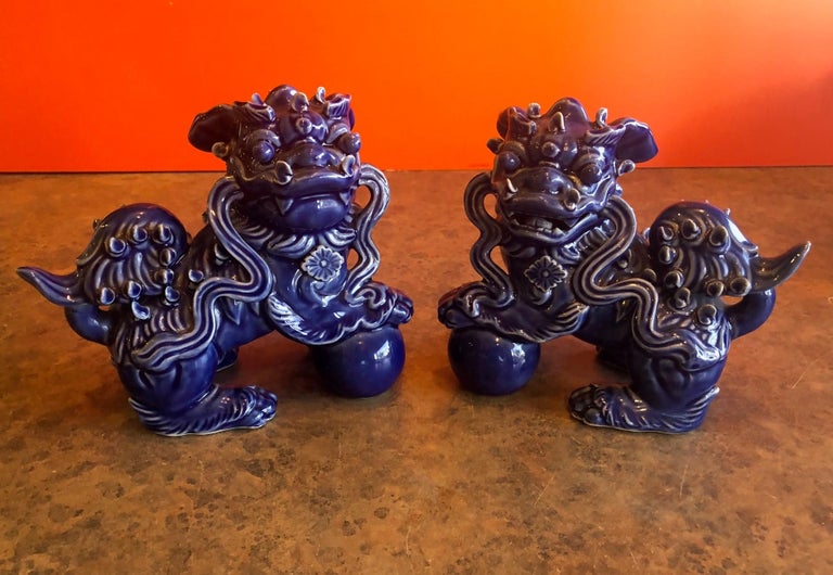 Pair of Midcentury Dark Blue Chinese Ceramic Foo Dogs at 1stDibs