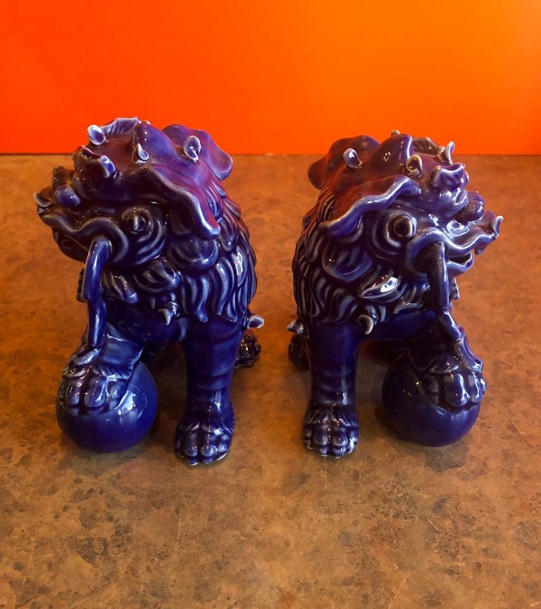 Pair of Midcentury Dark Blue Chinese Ceramic Foo Dogs at 1stDibs