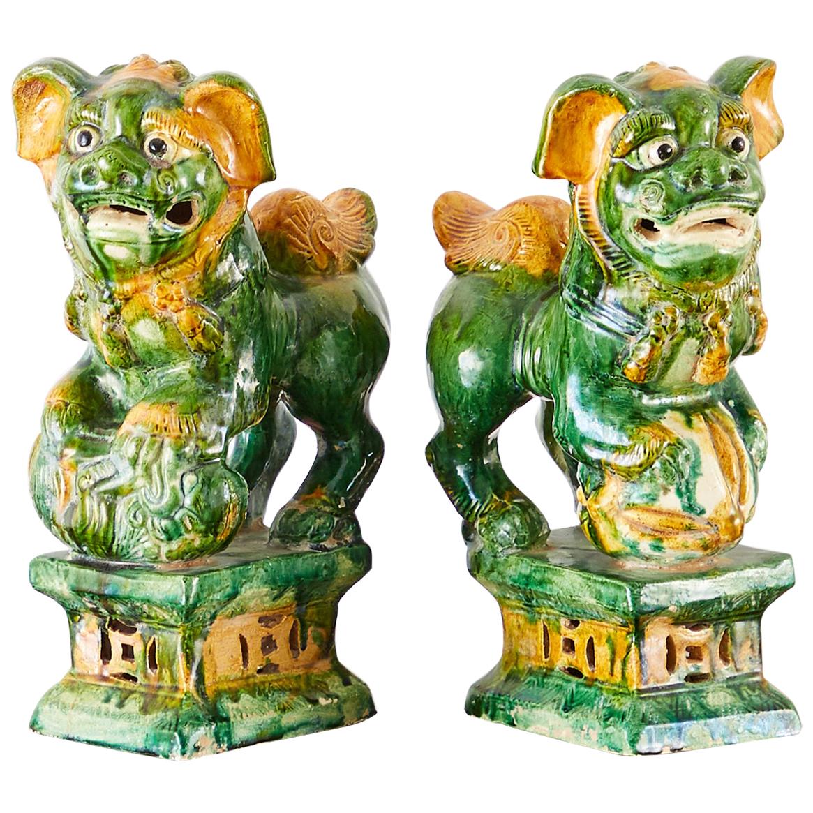 Pair of Ming Style Glazed Foo Dogs on Stands at 1stDibs