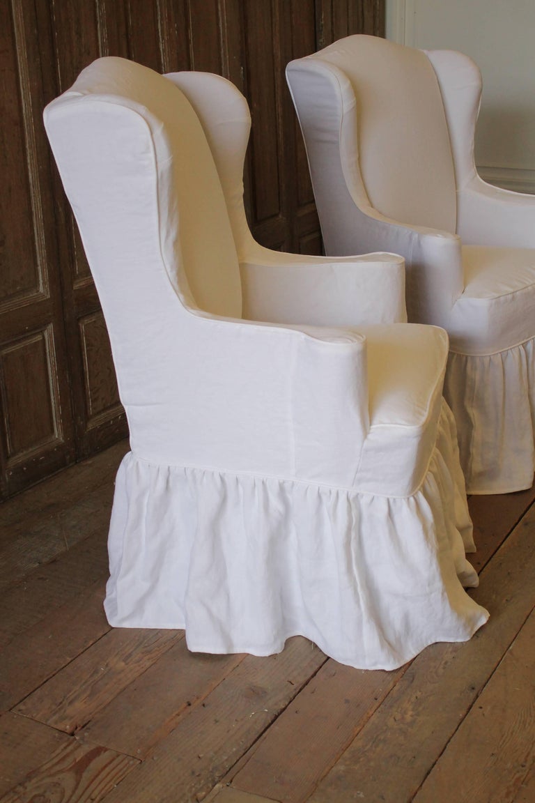 Pair of Modern White Linen Slip Covered Wingback Chairs with Ruffle ...