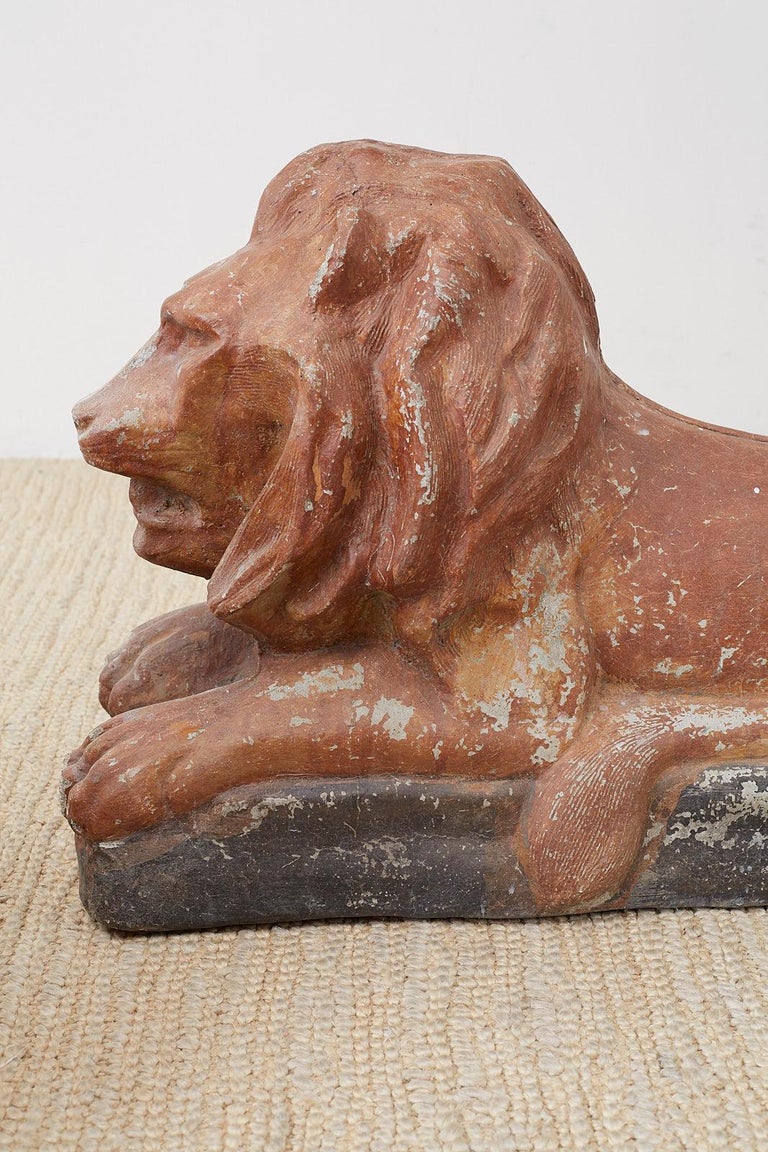 Pair of Neoclassical Cast Stone Recumbent Lion Sculptures at 1stDibs