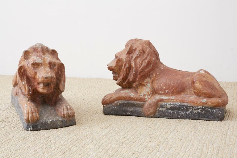 Pair of Neoclassical Cast Stone Recumbent Lion Sculptures at 1stDibs
