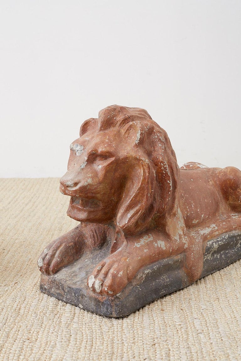 Pair of Neoclassical Cast Stone Recumbent Lion Sculptures at 1stDibs