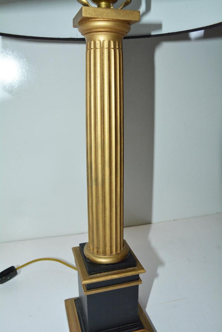 Pair of Neoclassical Gold and Black Column Lamps at 1stDibs