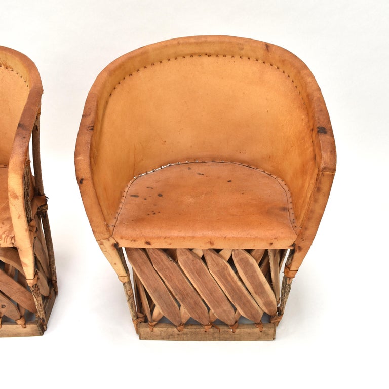 Pair of North or Native American Chairs in Leather and Wood at 1stDibs