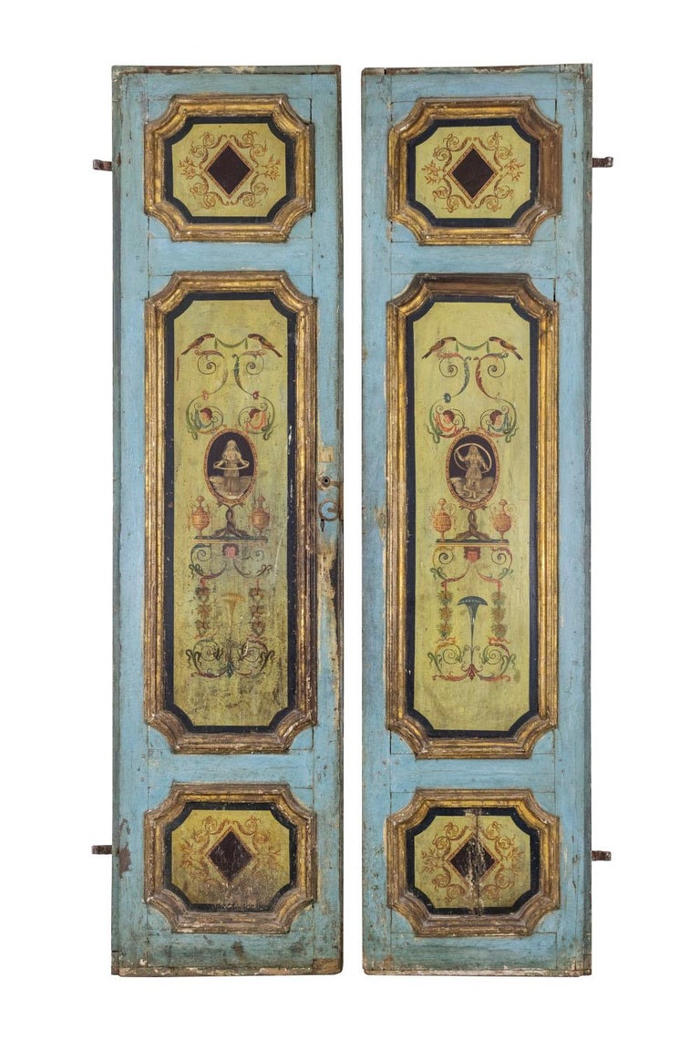 Pair of Pageantry Wood Doors with Grotesques, 18th Century at 1stDibs